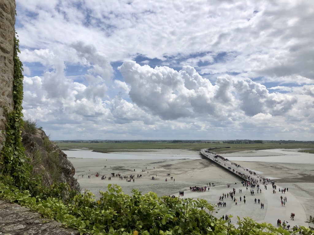 Normandy-Mont-Saint-Michel-mud-flats-bridge | The Postcard